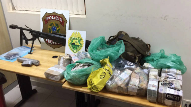 Eight people arrested in Paraguay heist: Brazil Eight people arrested in Paraguay heist: Brazil