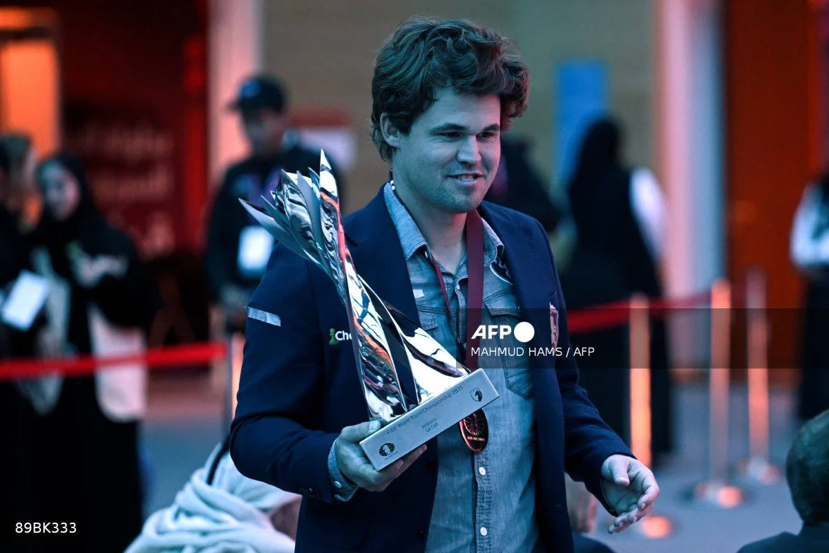 Magnus Carlsen clinches 20th world chess title in Doha