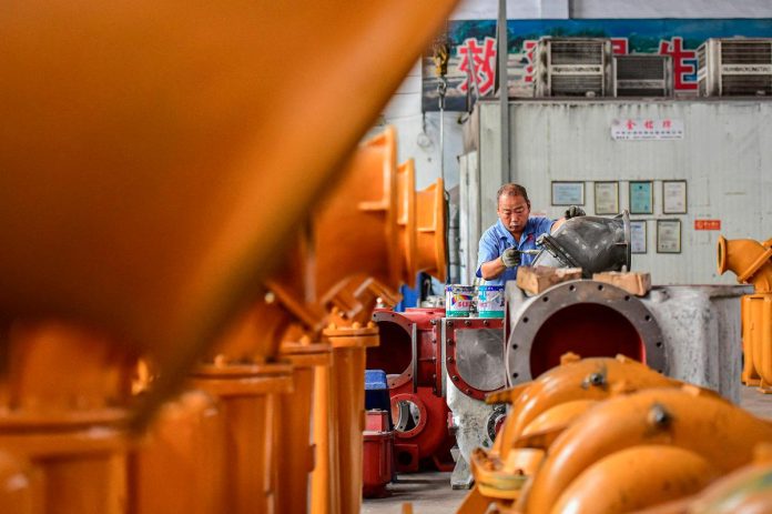 China manufacturing shrinks in June despite trade war respite