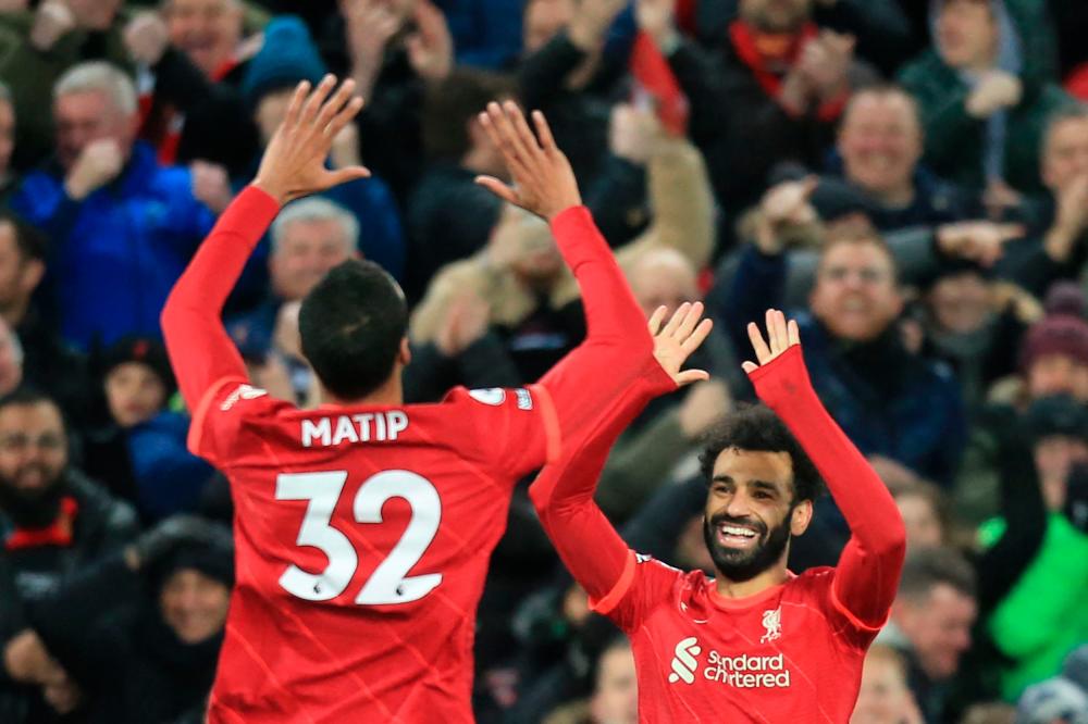 Liverpool put six past Leeds to cut Man City’s lead