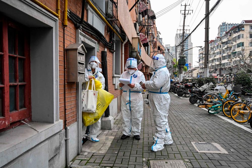 Shanghai to impose phased Covid-19 lockdown