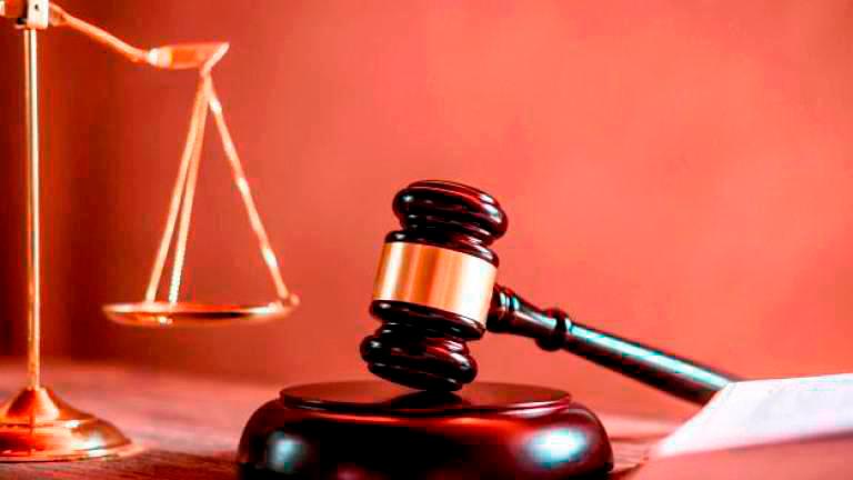 Two POS Malaysia senior officers charged with corruption